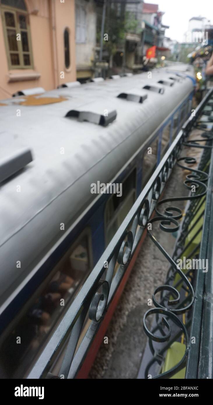 train crossing famous train street in hanoi vietnam Stock Photo - Alamy