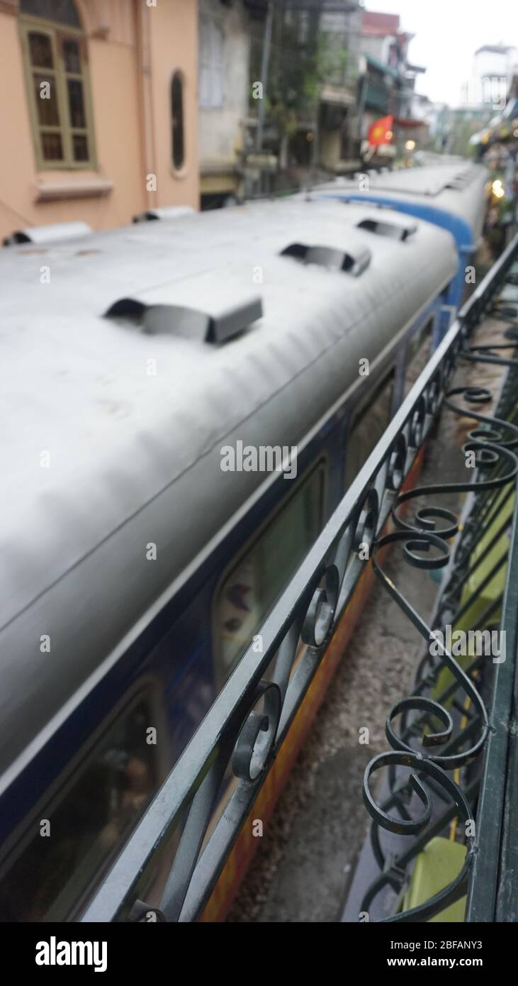 train crossing famous train street in hanoi vietnam Stock Photo - Alamy