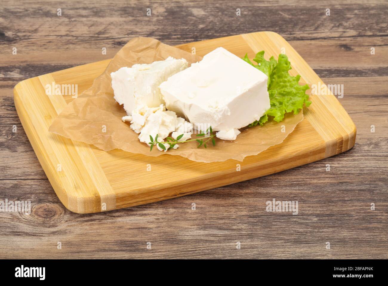 Greek traditional Feta soft cheese in the plate Stock Photo - Alamy