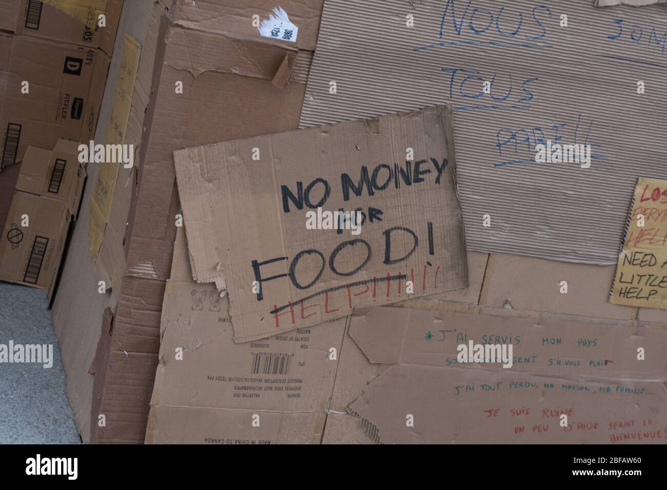 Homeless person sign No Money for Food written on cardboard tagged on ...