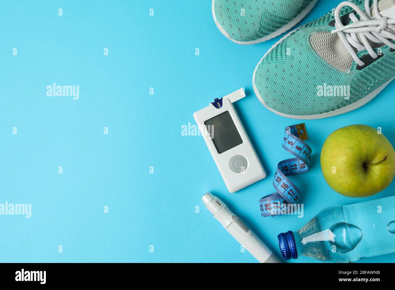 Concept of a healthy diabetic on blue background. Sports diabetic Stock ...