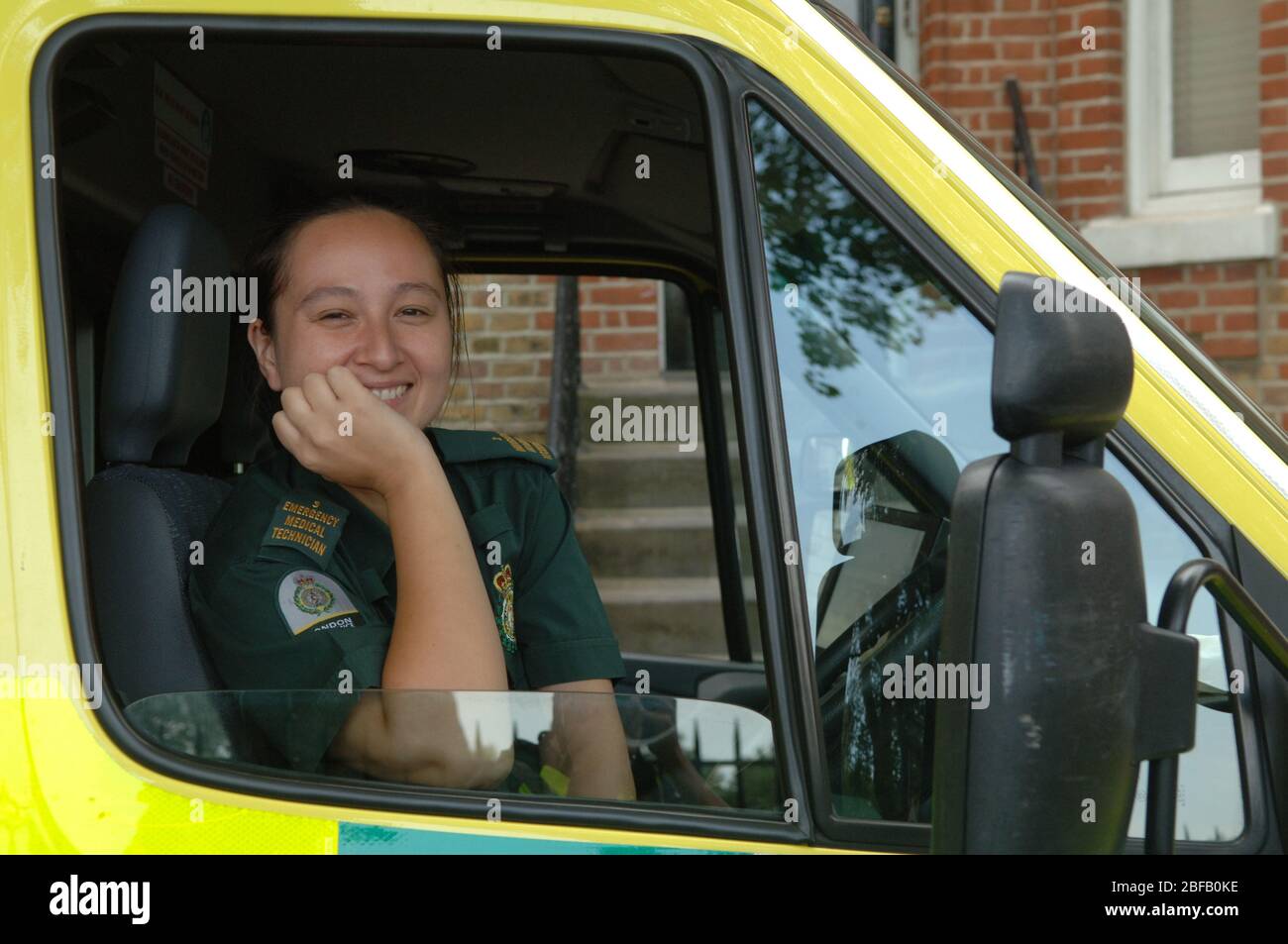 London ambulance driver sitting at the wheel of an ambulance Stock ...