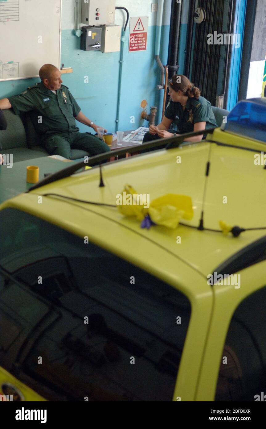 Paramedics waiting to be called to an emergency Stock Photo - Alamy