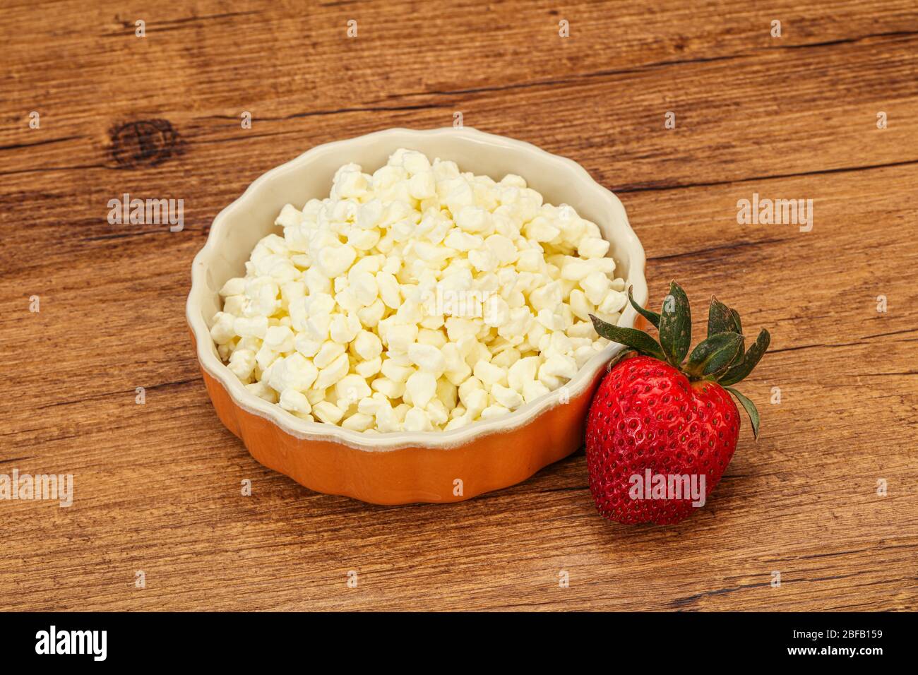 Dietary food - grain cottage cheese in the bowl Stock Photo - Alamy