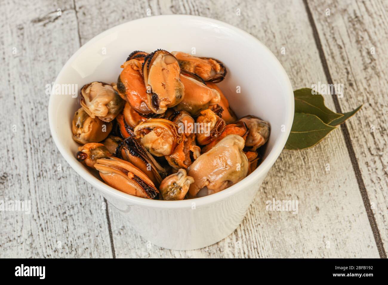 Pickled mussels with spices in the bowl Stock Photo - Alamy