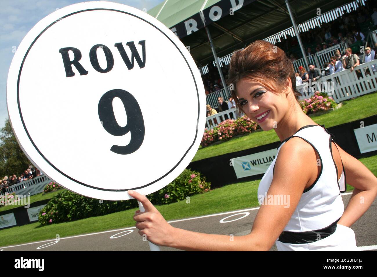 Beautiful Grid Girls at 2010 GOODWOOD Revival Stock Photo - Alamy