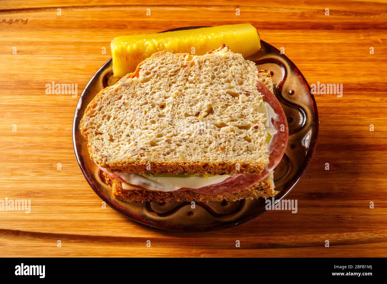 salami sandwich creation sequence Stock Photo - Alamy