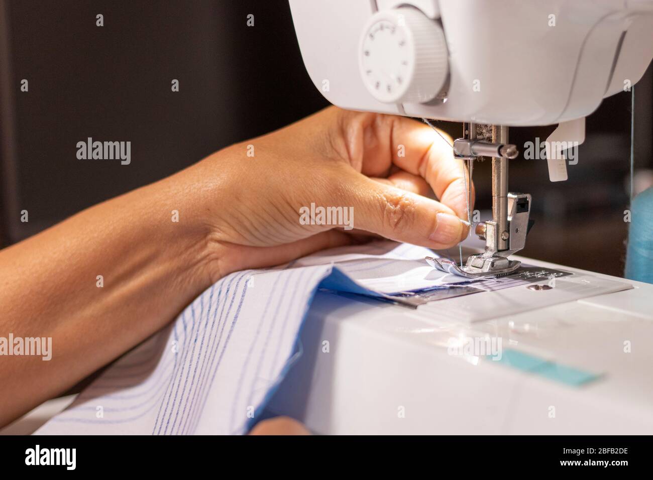 Women working sewing machines hi-res stock photography and images - Alamy