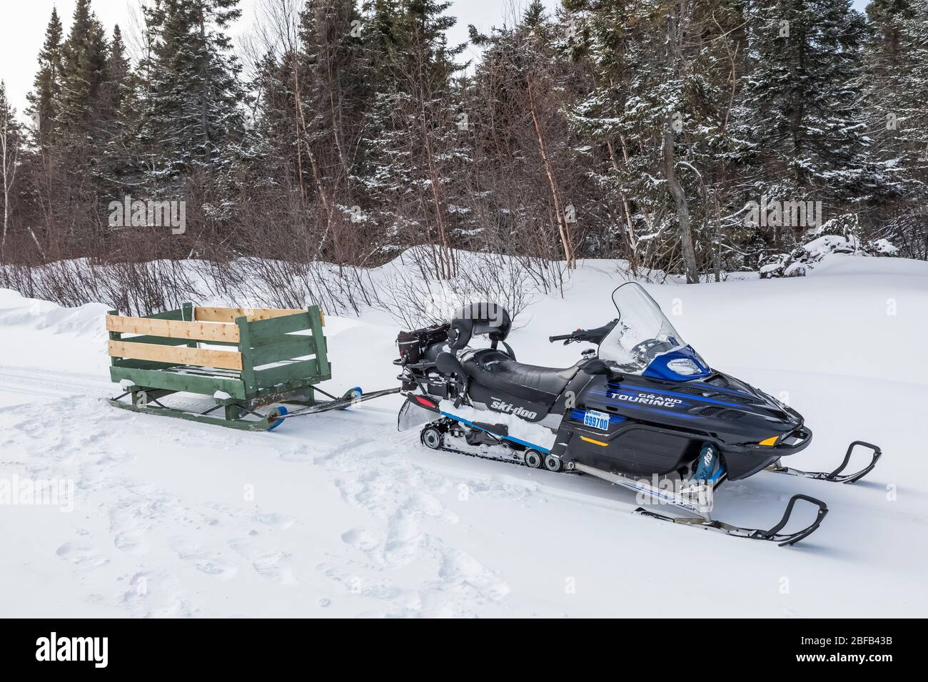 Snow Machine and sled for cutting and hauling firewood in Buchans ...