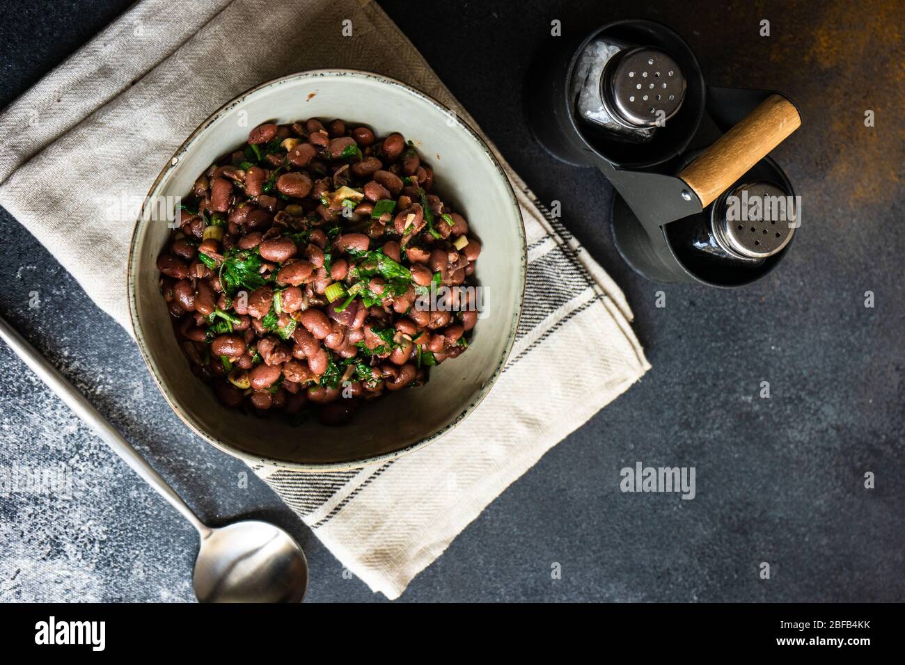 Traditional georgian dish lobio in ceramic bowl on stone background ...