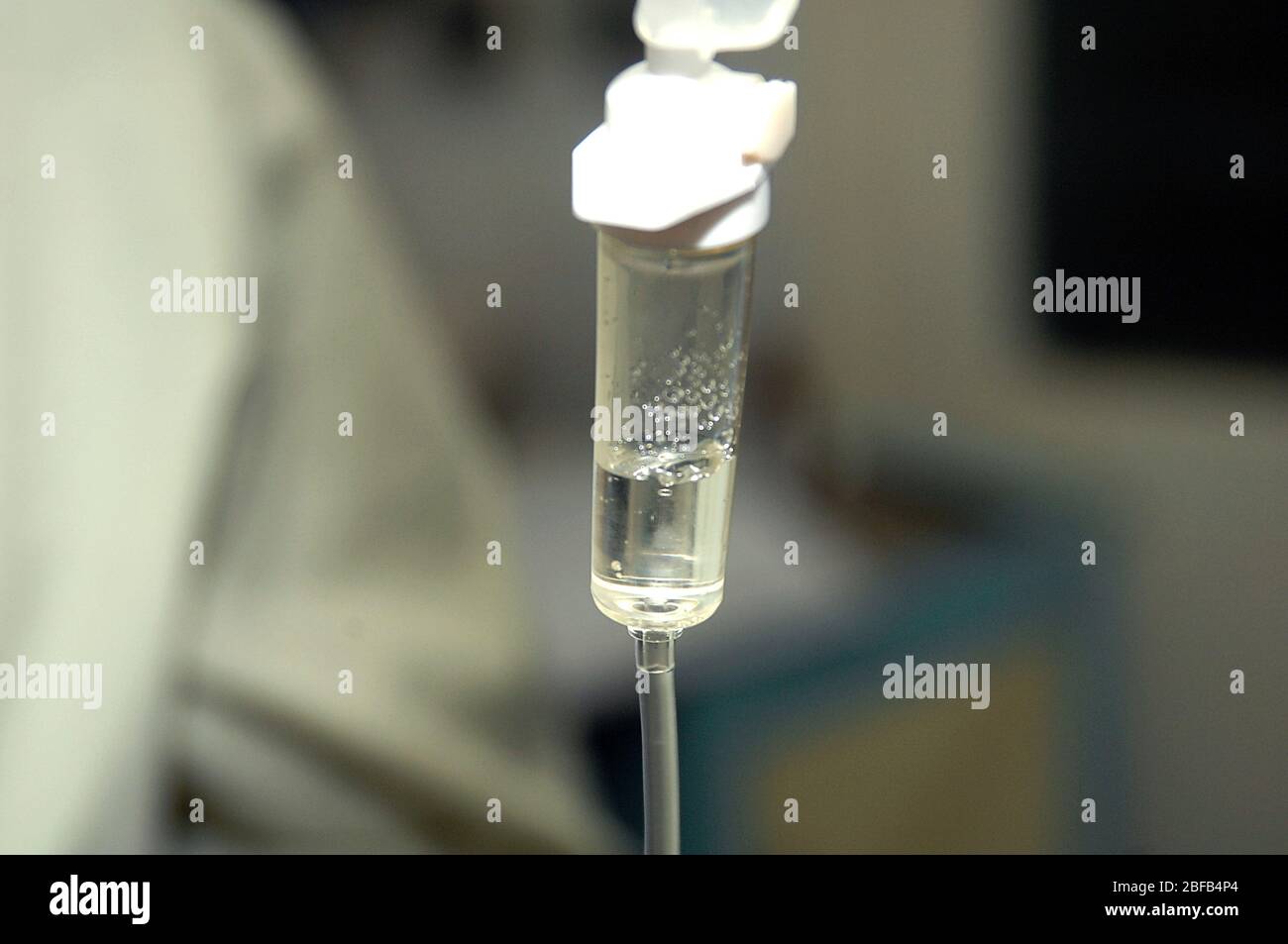 An Intravenous drip, leading from a saline solution bag Stock Photo - Alamy