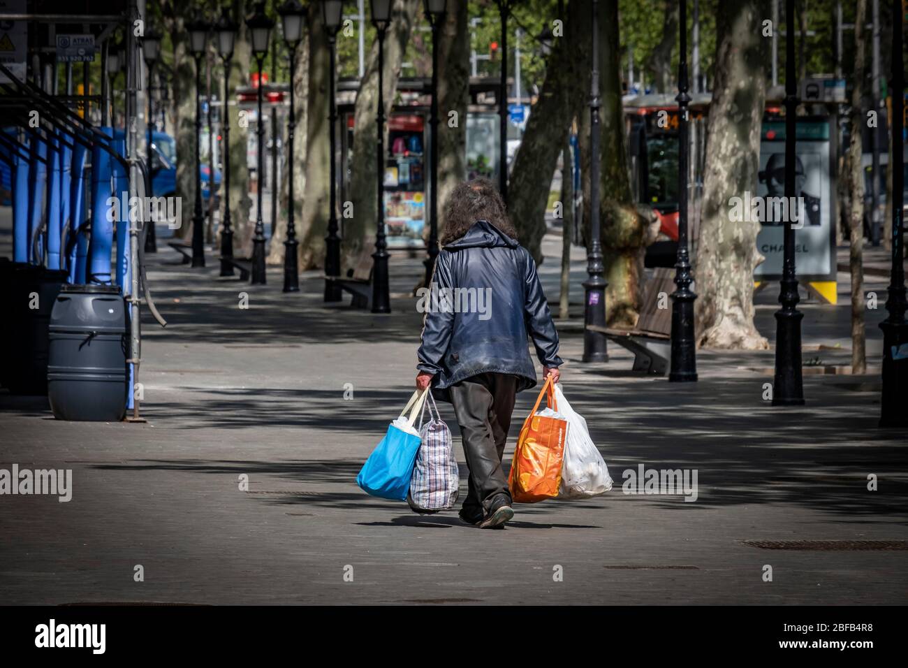 Homeless walking hi-res stock photography and images - Alamy