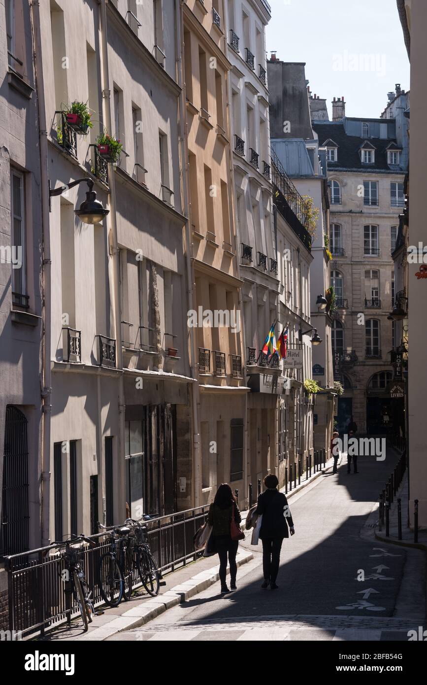 Paris, France - Mar 2014: Shadows and narrow streets close to Notre ...