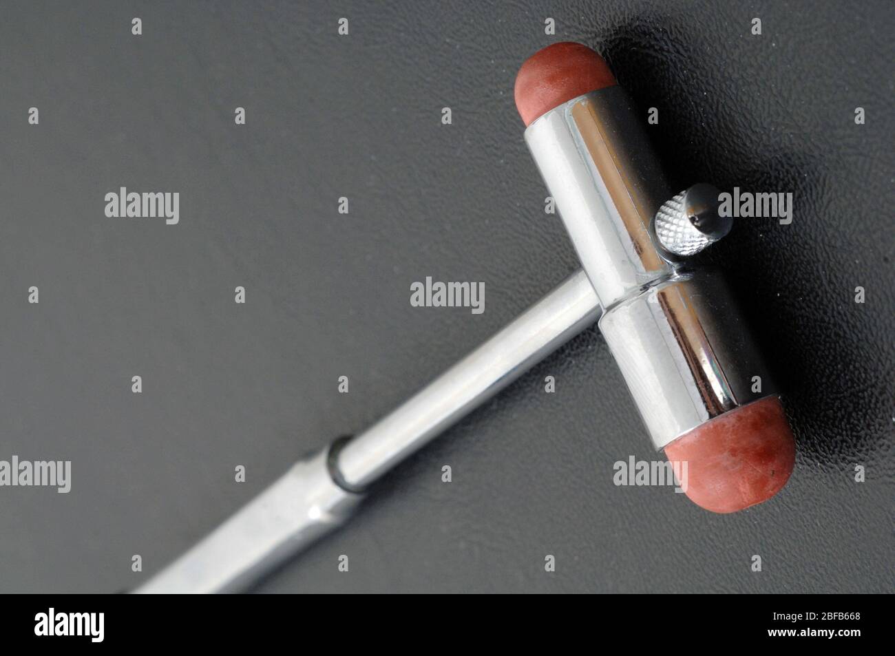 Patella reflex hammer Stock Photo - Alamy