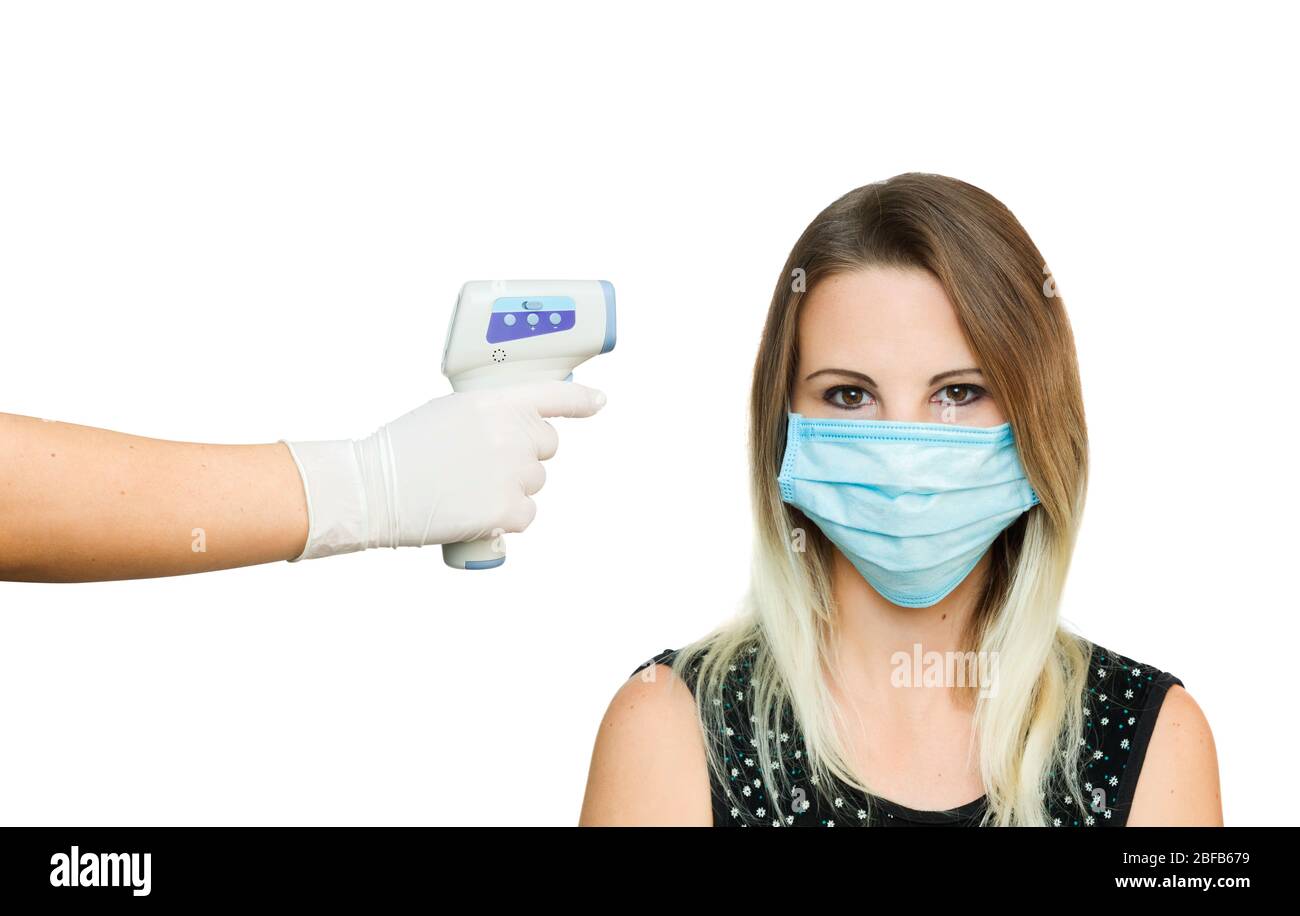 measurement of woman's temperature by infrared non-contact thermometer ...