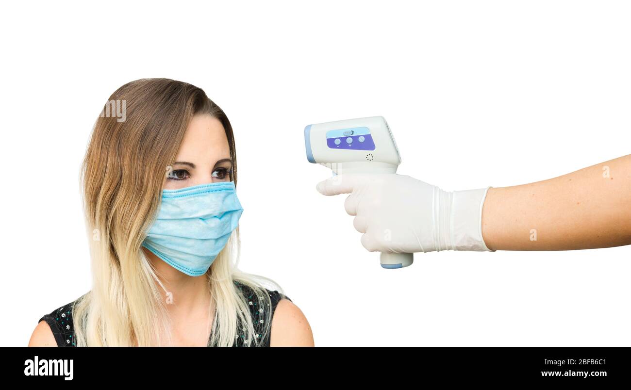 measurement of woman's temperature by infrared non-contact thermometer ...