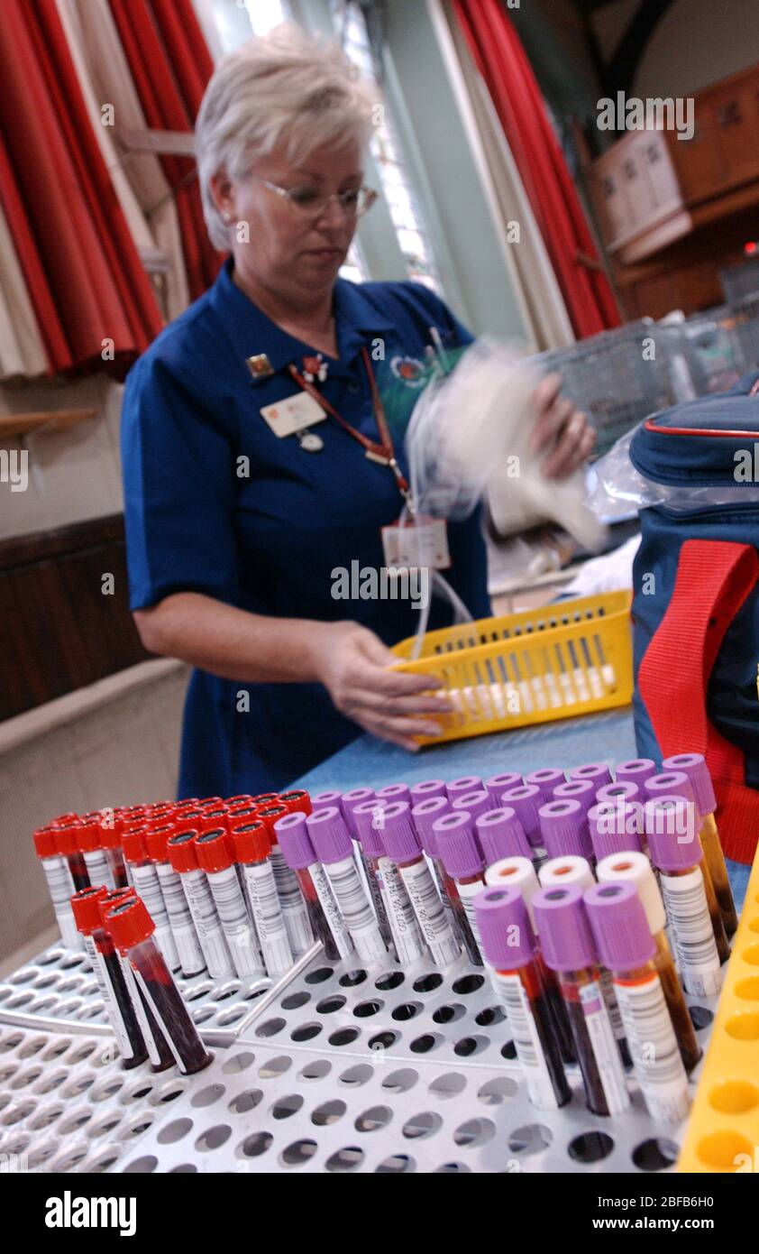 A NHS National Blood Service nurse packs blood donated at a collection ...