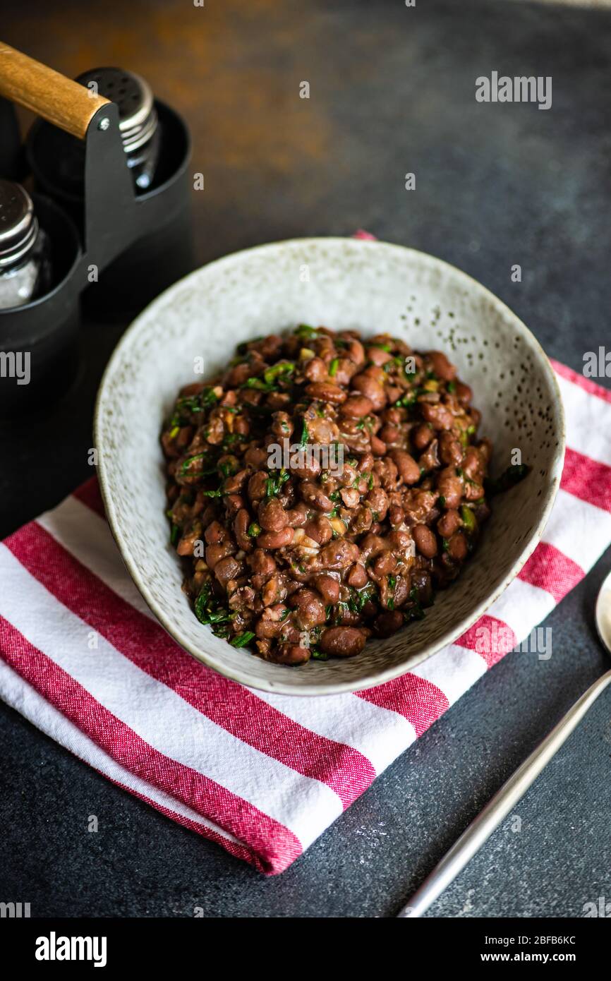 Traditional georgian dish lobio in ceramic bowl on stone background ...