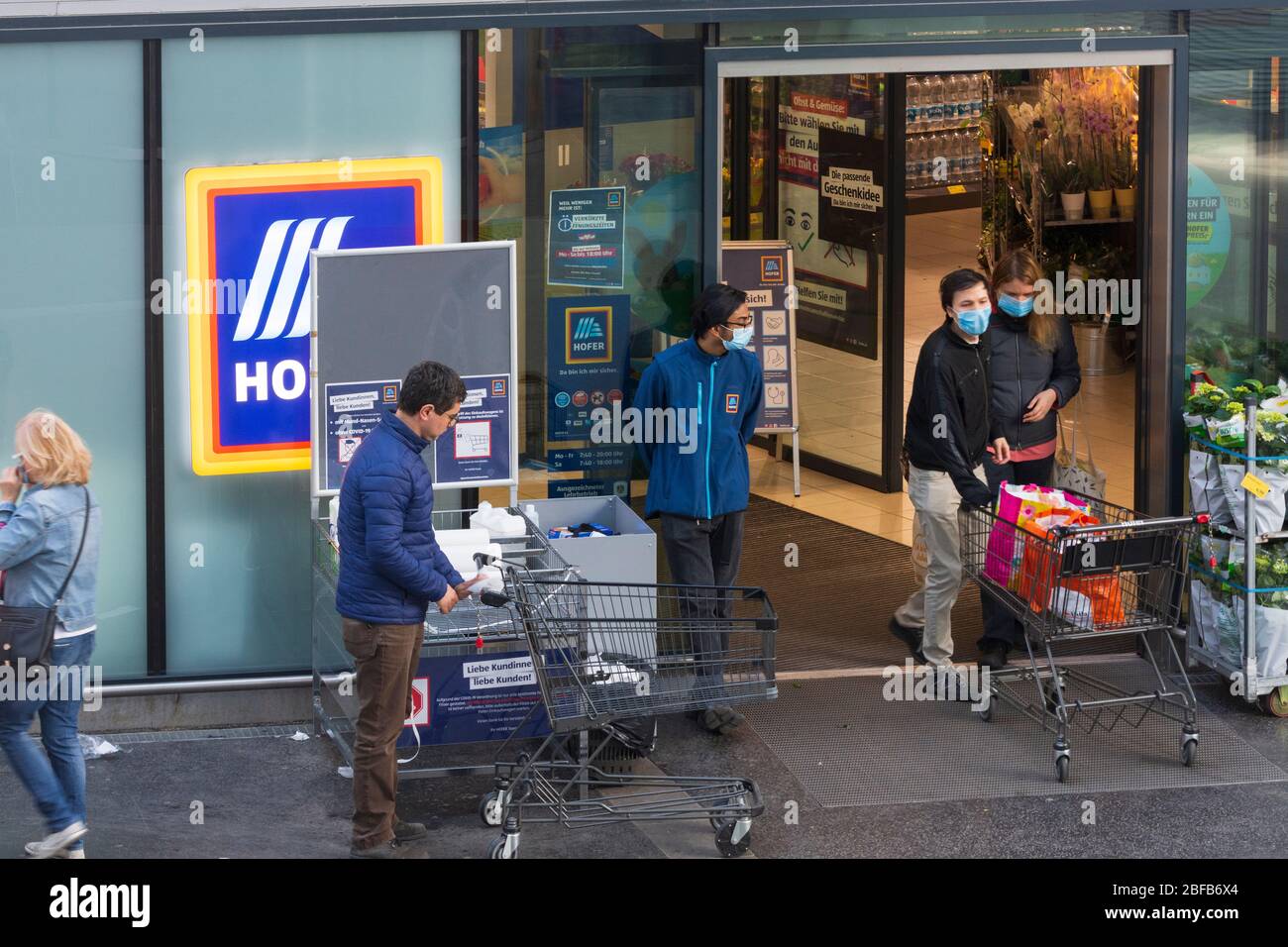 Wien, Vienna: people at Hofer supermarket getting face masks, due to ...
