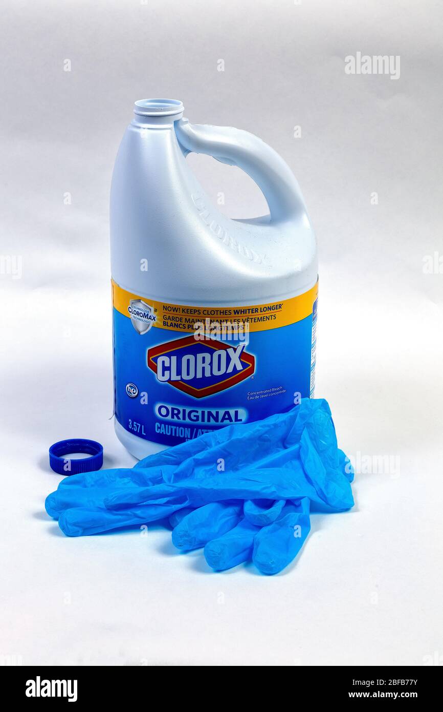 Chemical cleaning for disinfection with rubber cloves Stock Photo - Alamy