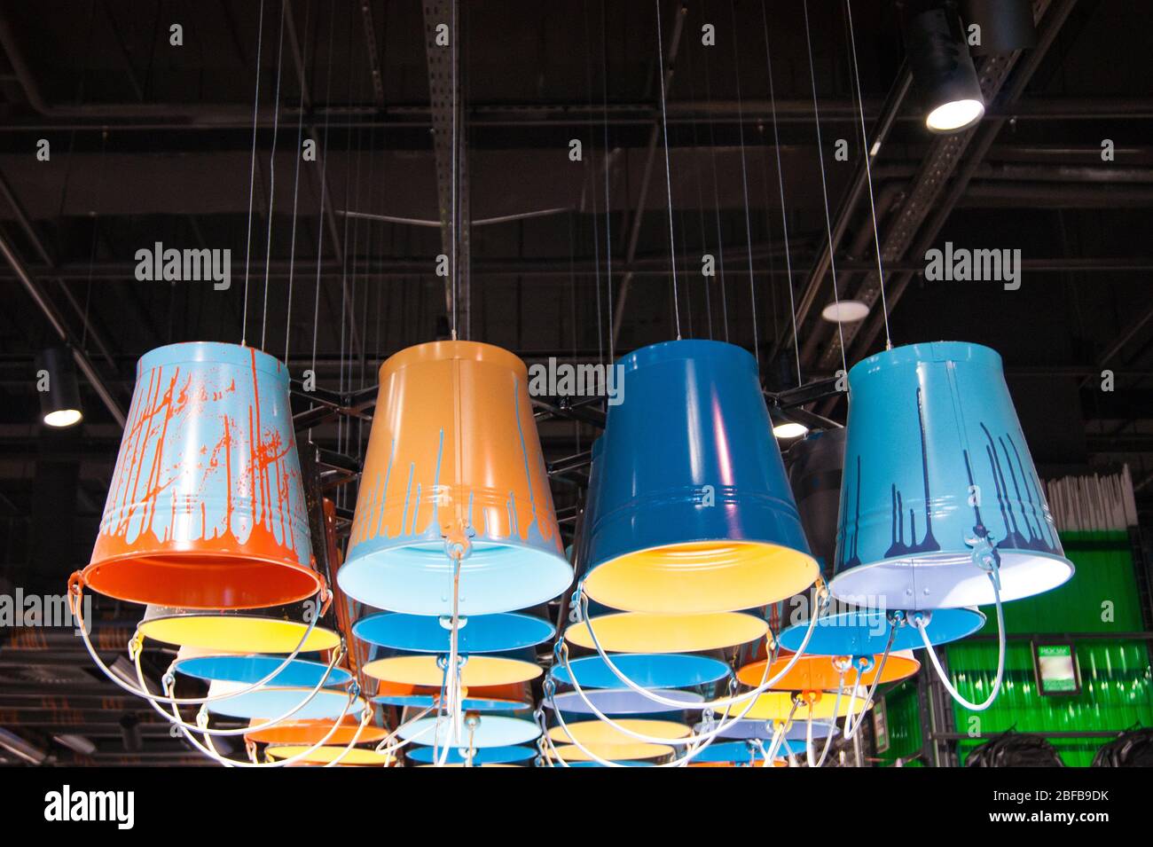 An element of interior design - ceiling lights under a dark ceiling ...