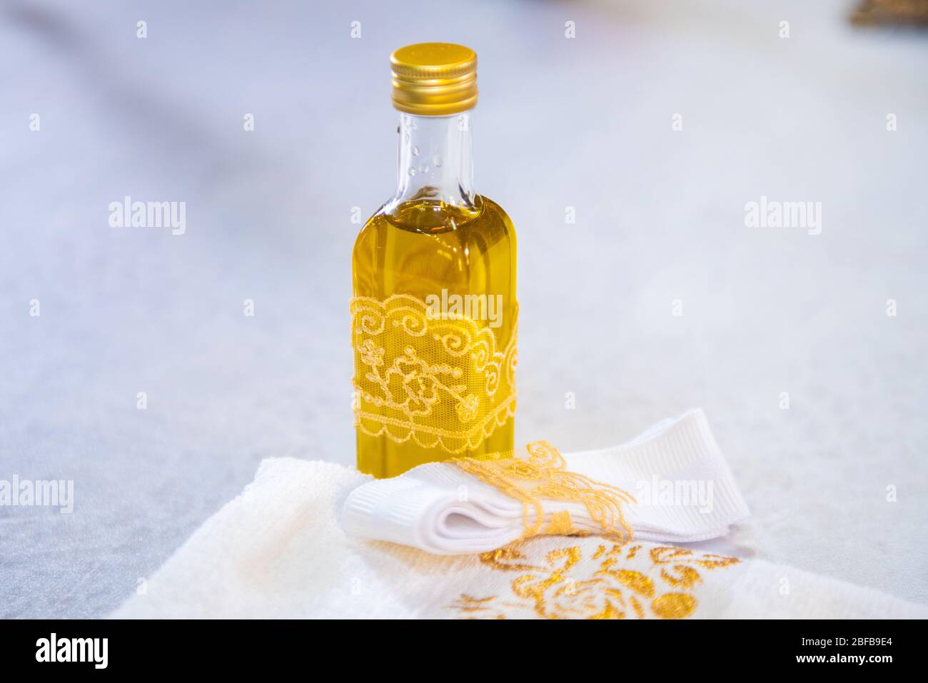 Holy chrism in a little bottle during a baptism ceremony Stock Photo ...