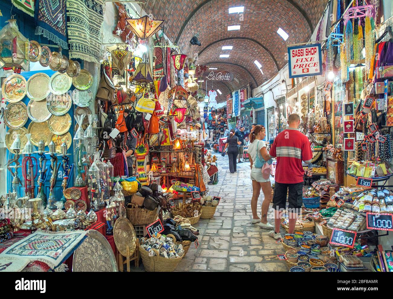 Tourists shopping in Souk, Medina, Sousse, Tunisia Stock Photo - Alamy