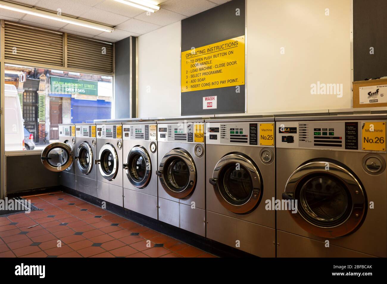 Full washing machine hi-res stock photography and images - Alamy