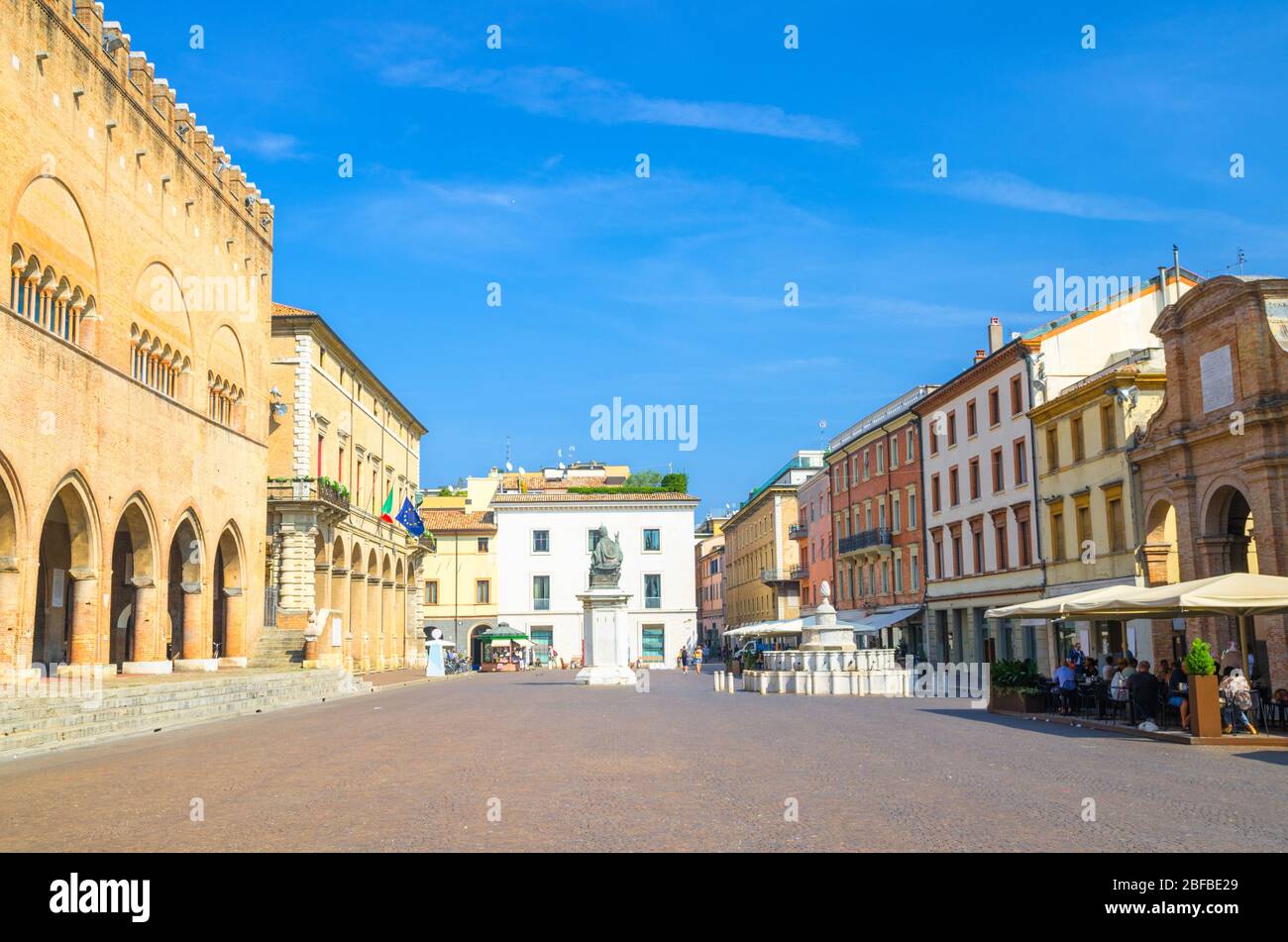 Old colorful multicolored building and houses and Pope Paul V monument ...
