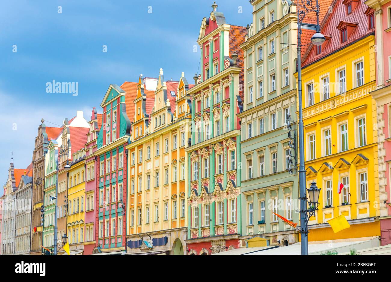 Row of colorful buildings with multicolored traditional facades on ...