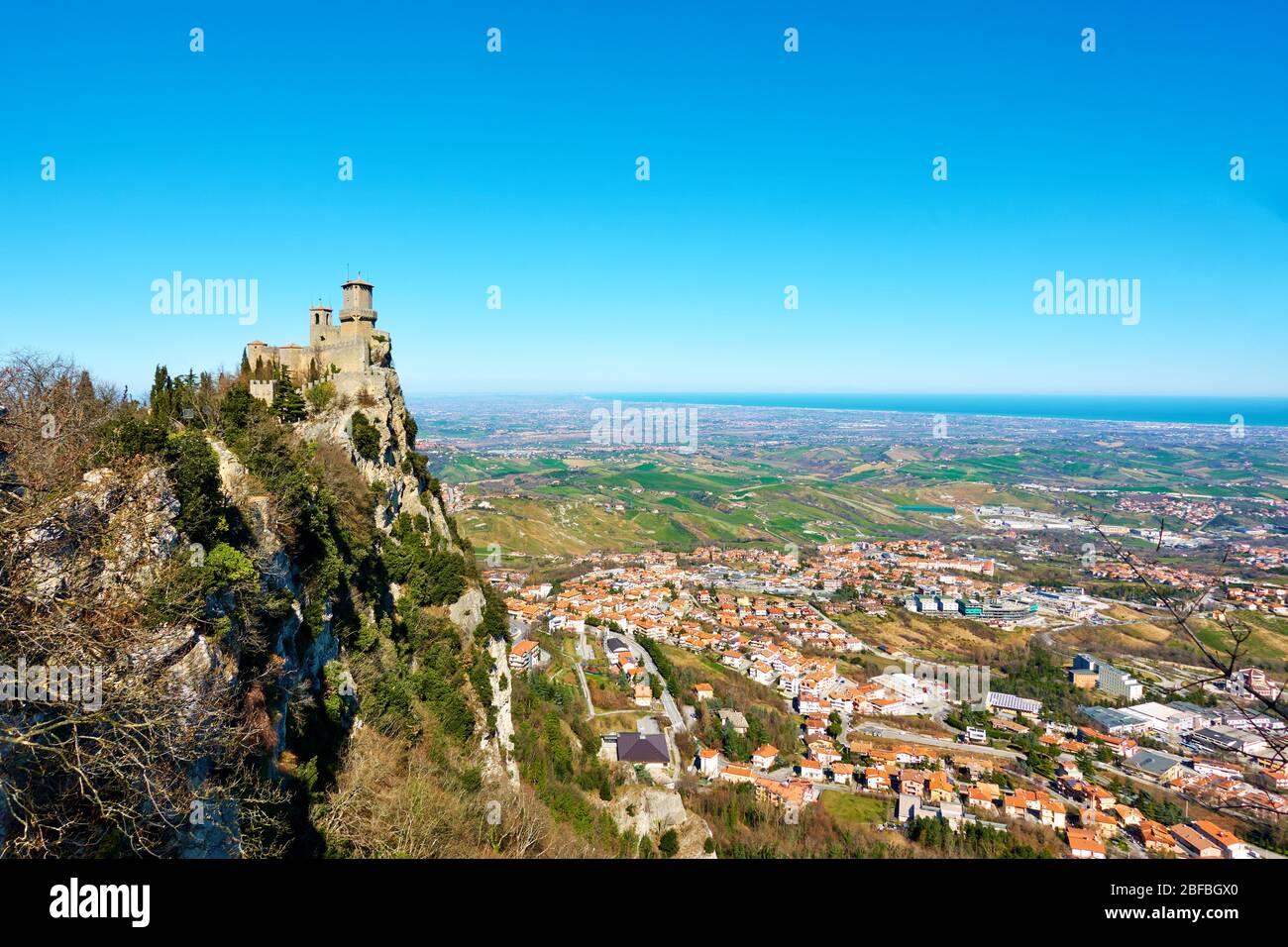 The first tower of San Marino and Borgo Maggiore at the foot of mount ...