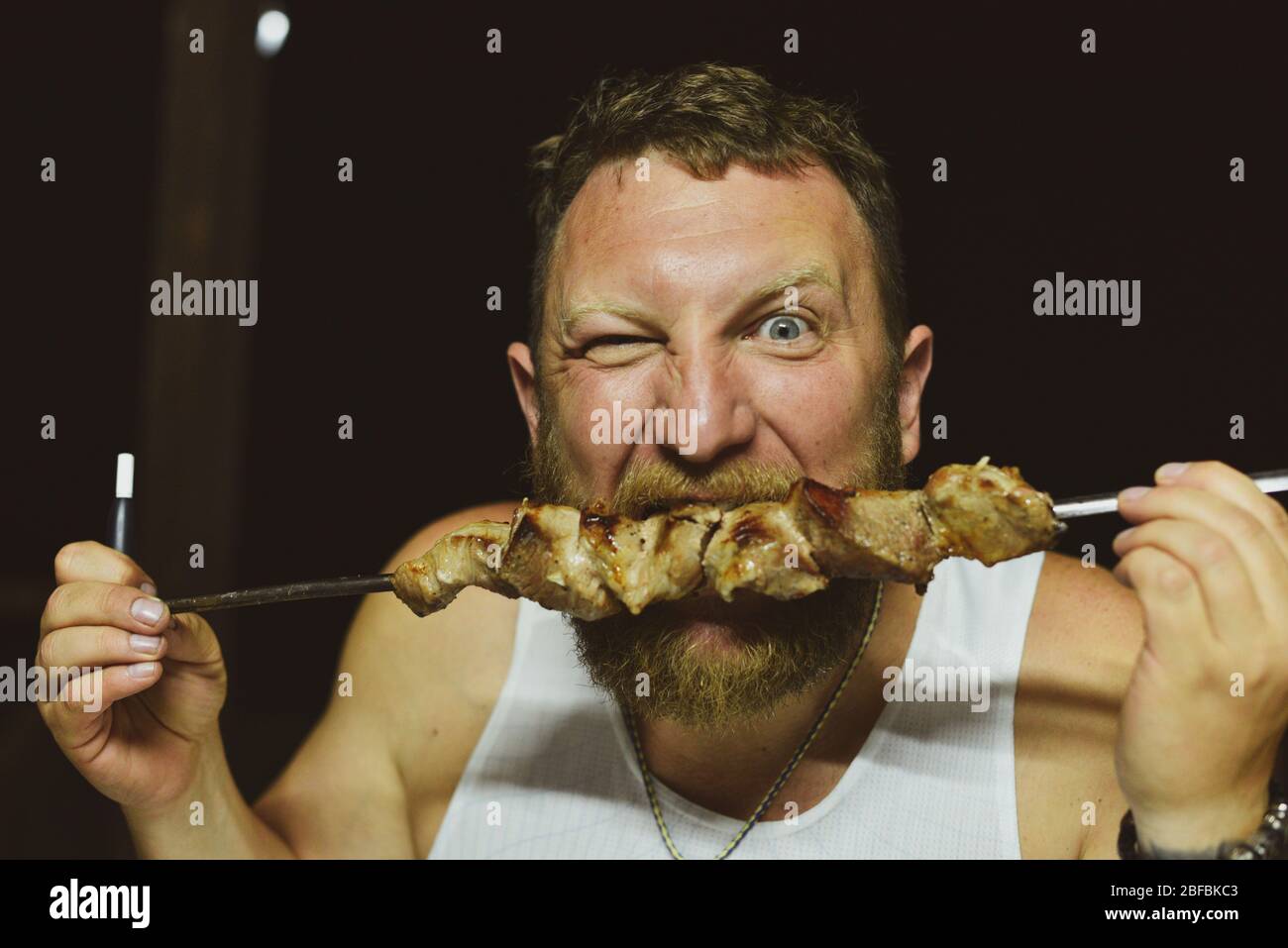 Fat man eating kebab hi-res stock photography and images - Alamy
