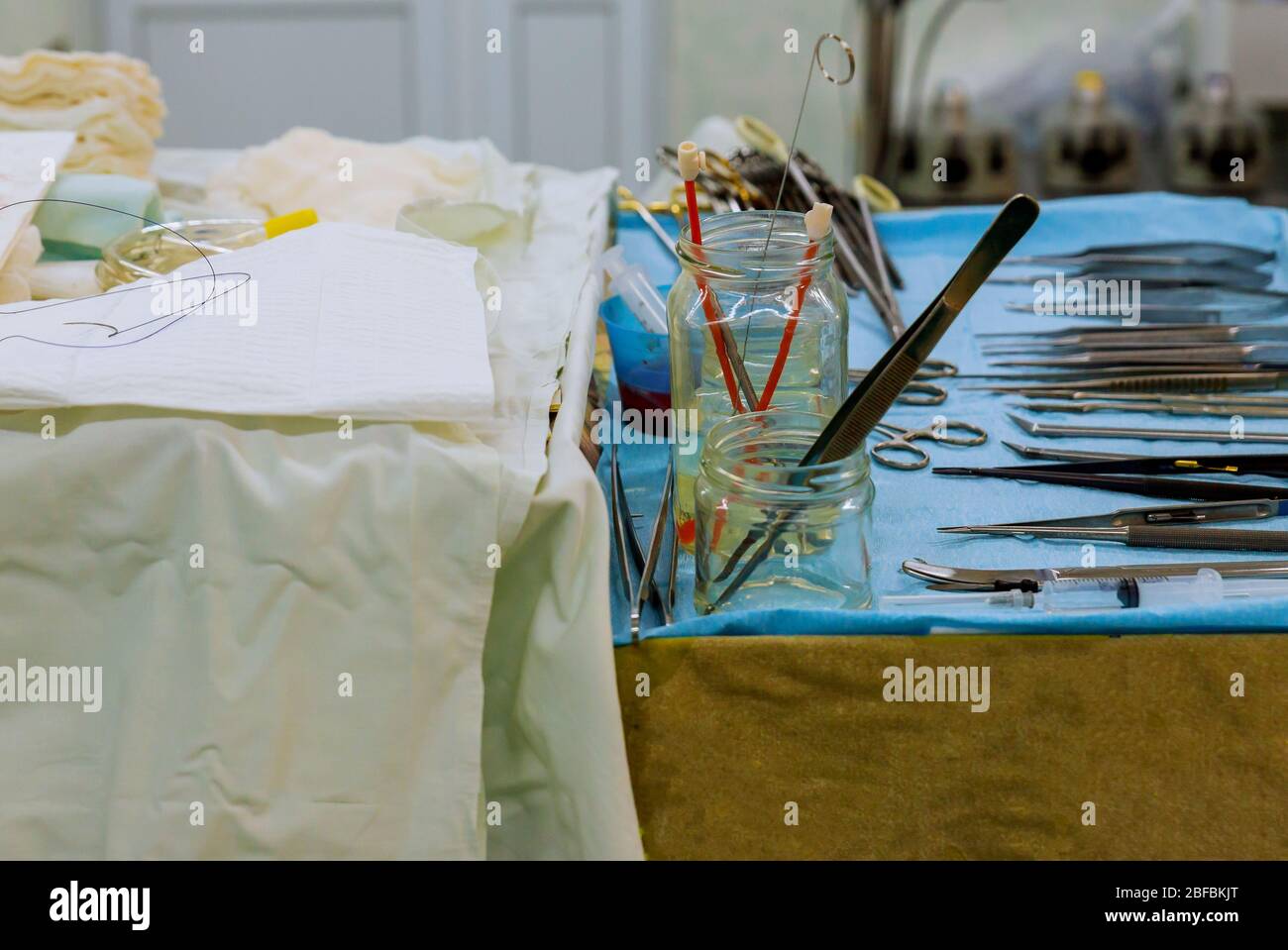 The tool use instrument on the surgical table in operating surgery room ...
