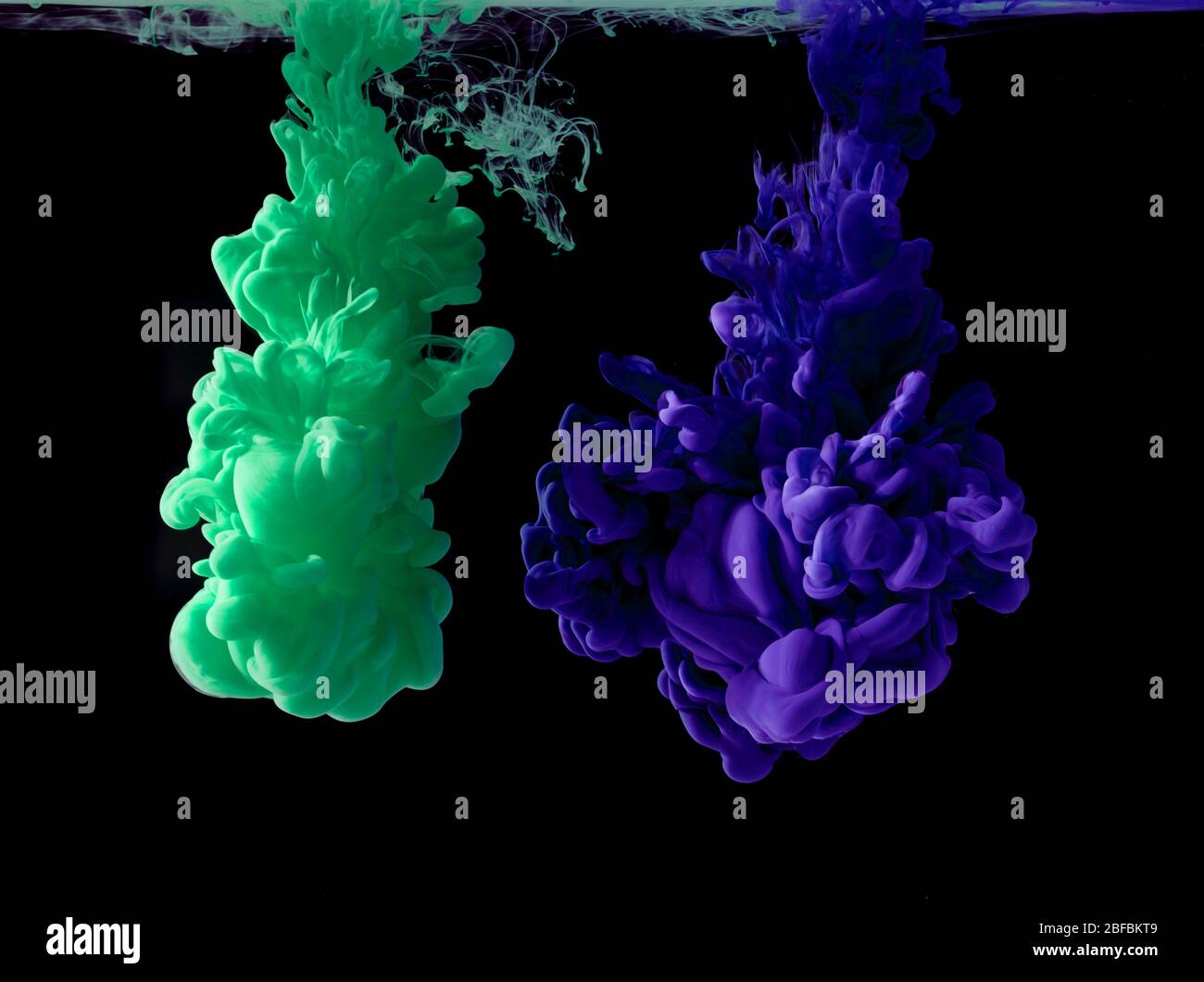 Purple ink in water colorful hi-res stock photography and images - Alamy