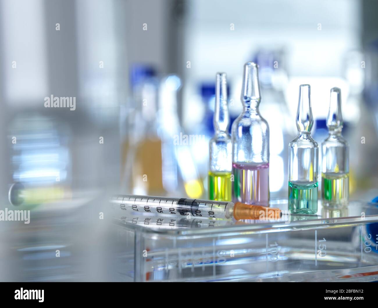 Pharmaceutical research. Scientist developing a new drug or vaccine in ...