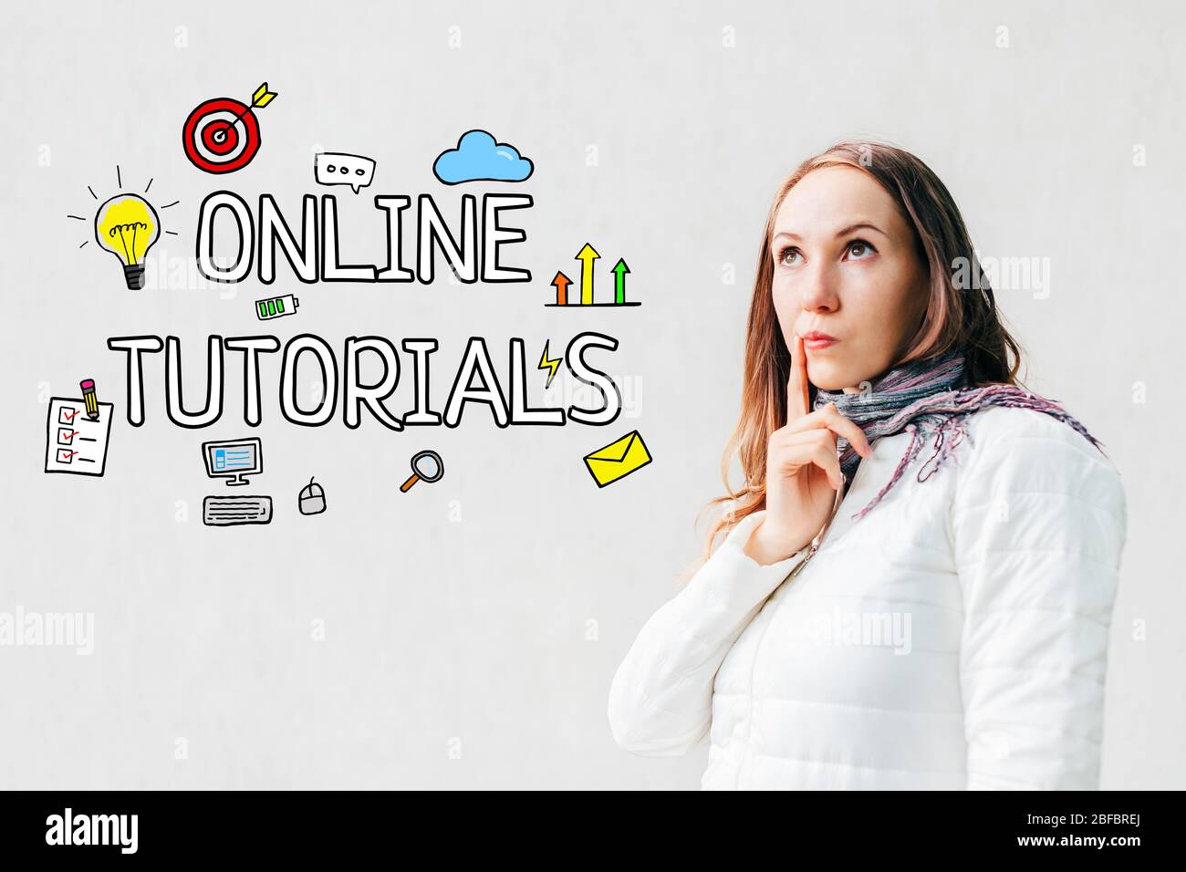 Online tutorials concept - girl on a white background with text and ...