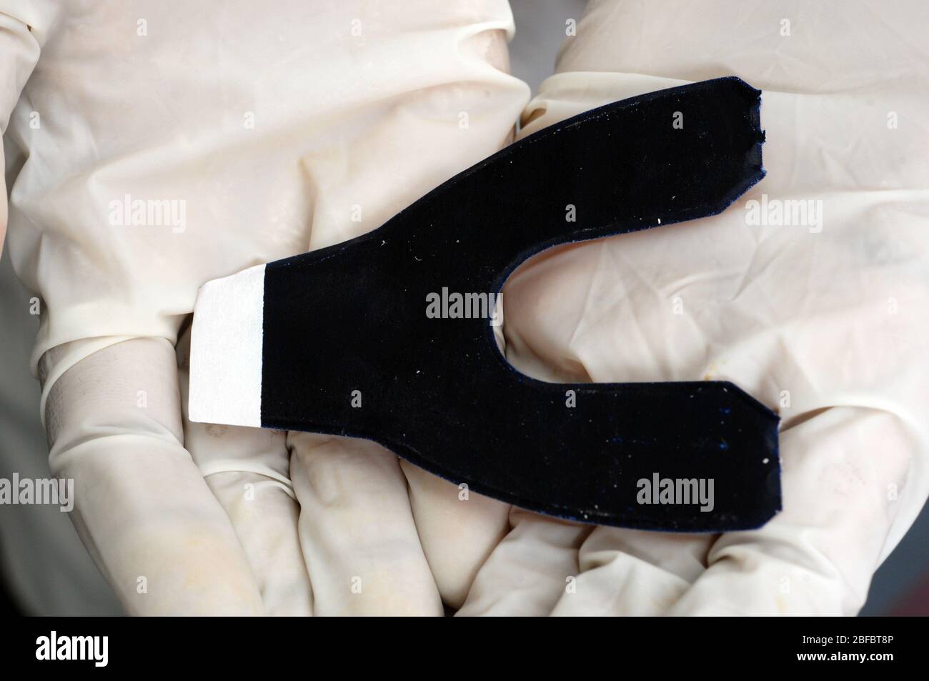 Articulation paper used to test a patient's bite Stock Photo - Alamy