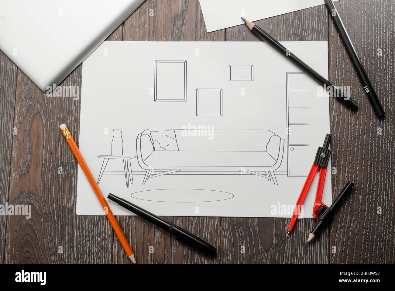 Making a living room design on white paper sheet Stock Photo - Alamy