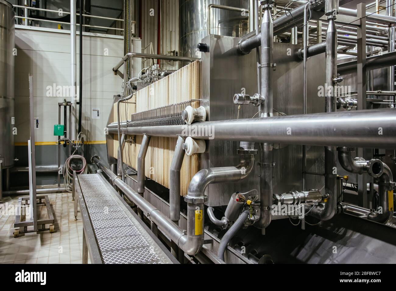 Filtration machinery in modern brewery production line Stock Photo - Alamy
