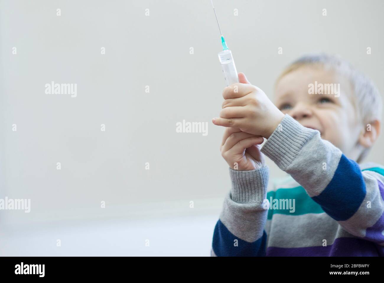 Children vaccination with needle and vakcine Stock Photo - Alamy