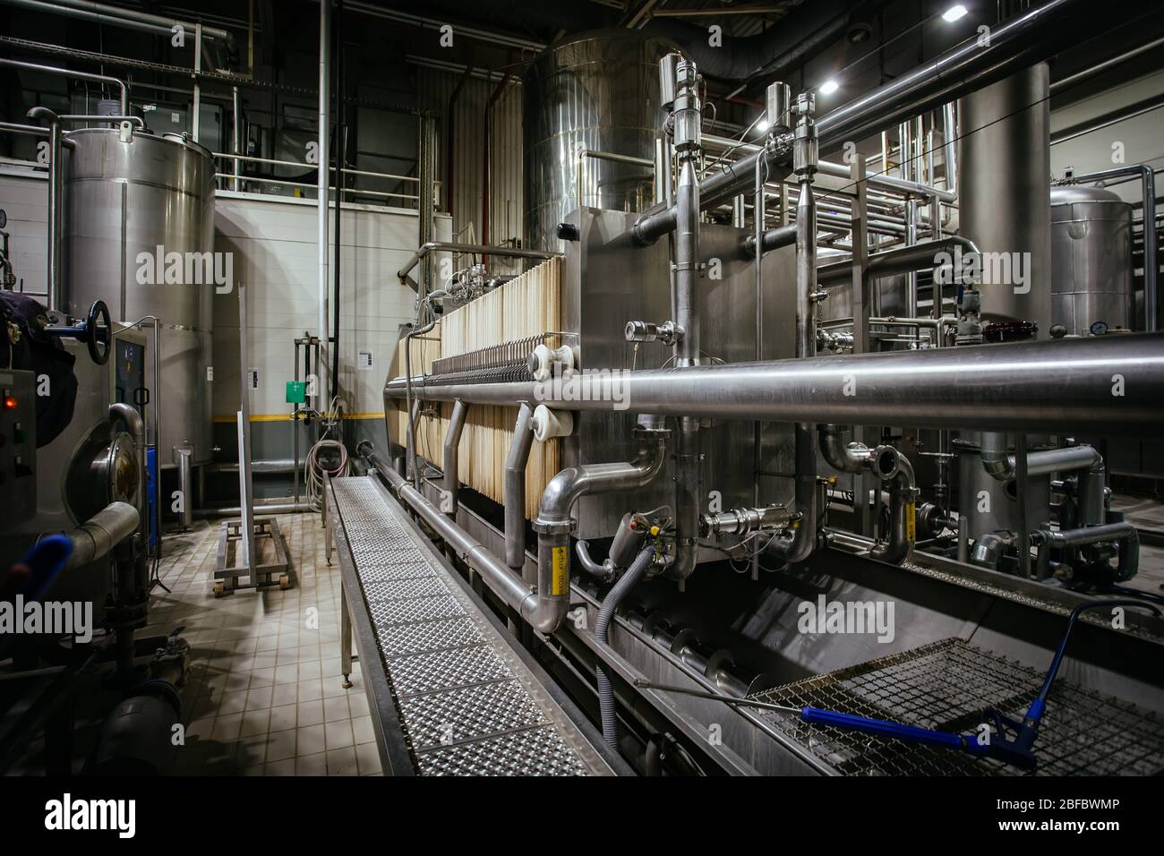 Filtration machinery in modern brewery production line Stock Photo - Alamy