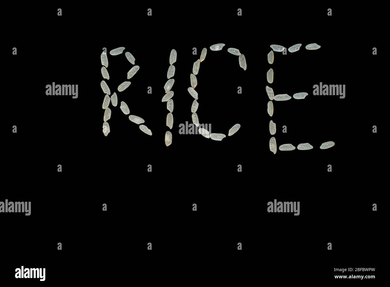 Rice text written with rices isolated on the black background Stock ...