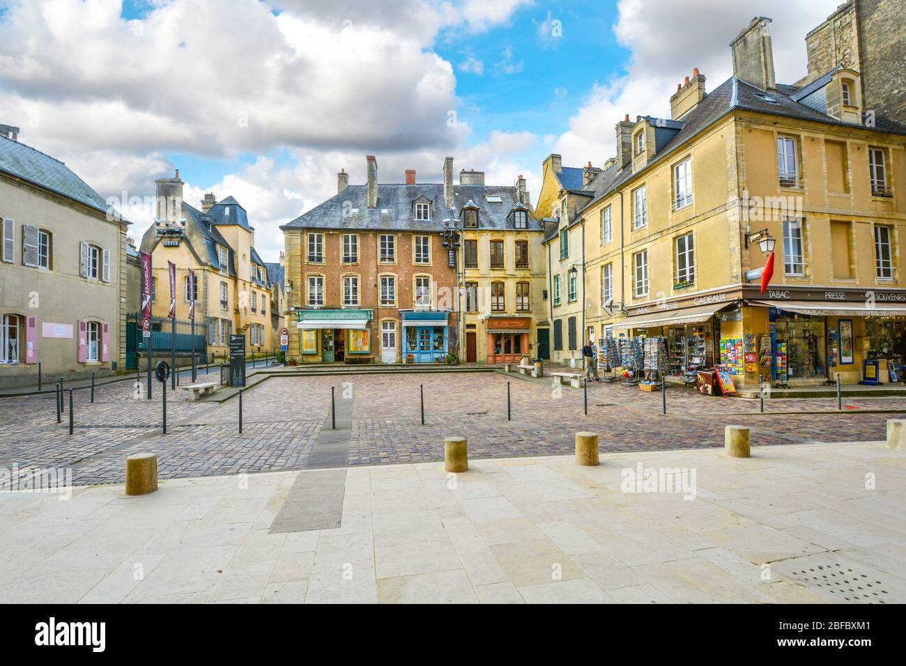 The small square outside the entrance to the Bayeux Cathedral, with ...
