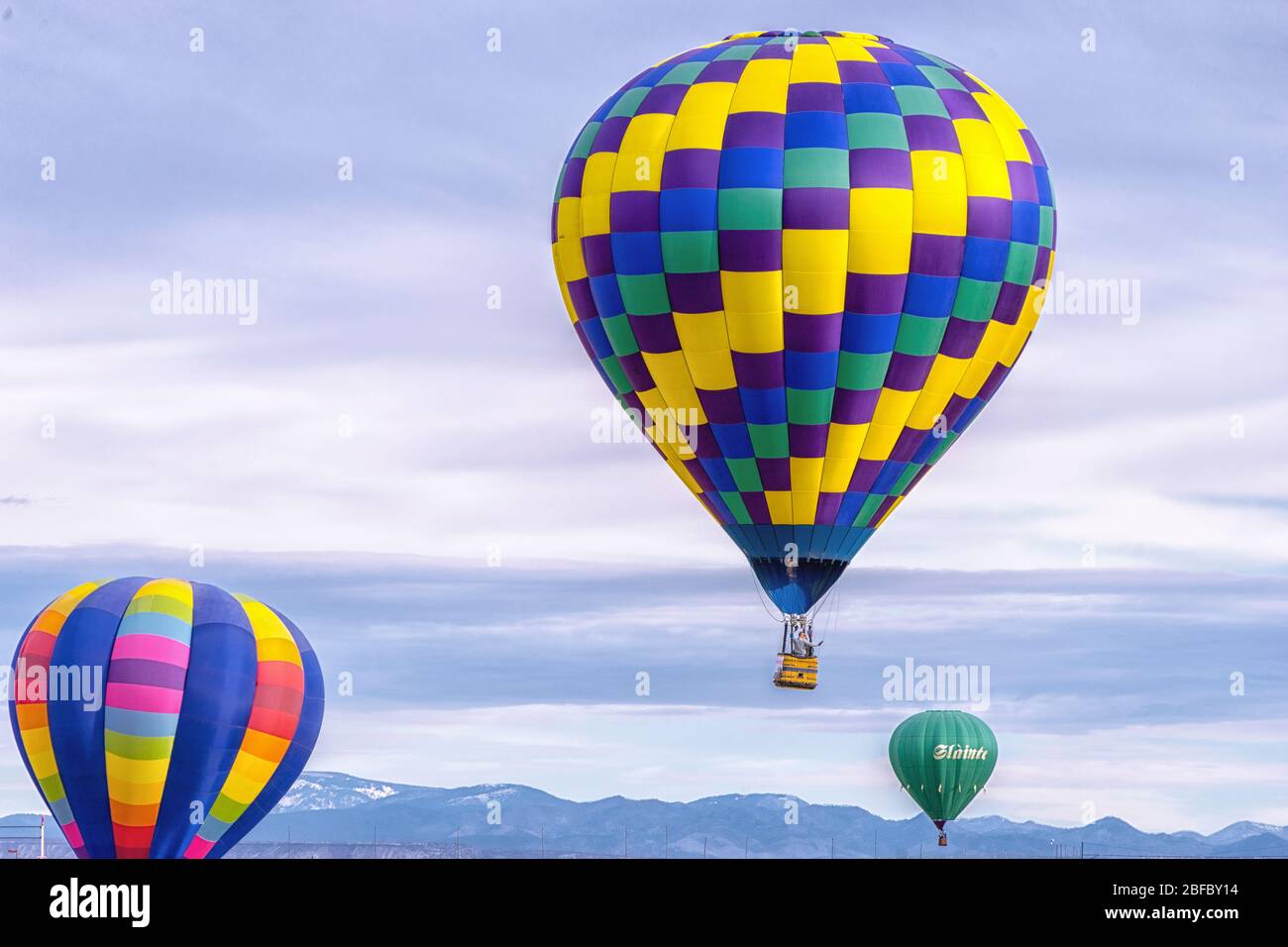 Multiple hot air balloons at take off in Al Stock Photo - Alamy