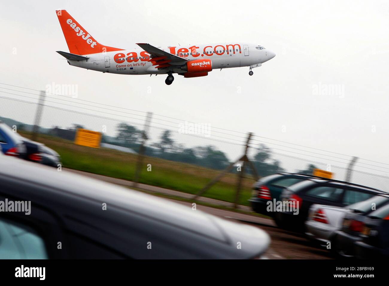 An EasyJet plane taking off at Luton Airport, London Stock Photo - Alamy