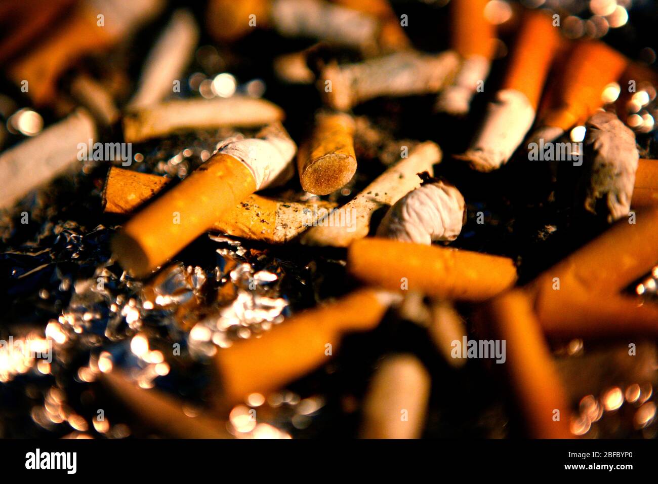 Close-up picture of cigarette ends Stock Photo - Alamy