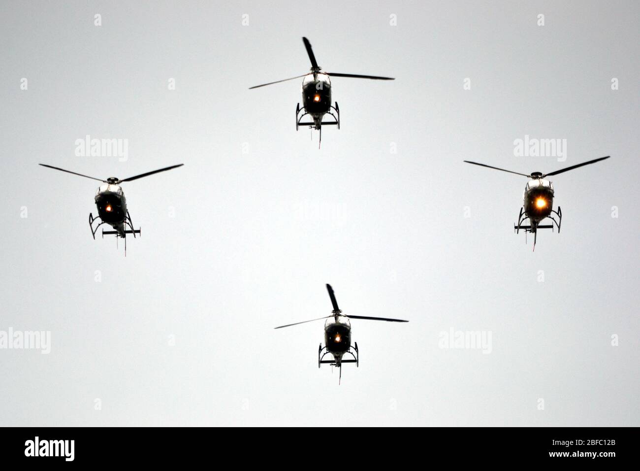 Military helicopters fly in formation hi-res stock photography and ...