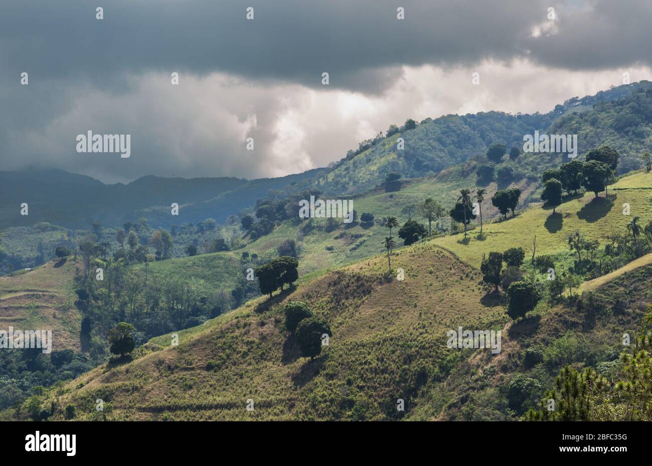 dramatic landscape image of the caribbean mountains in the dominican ...