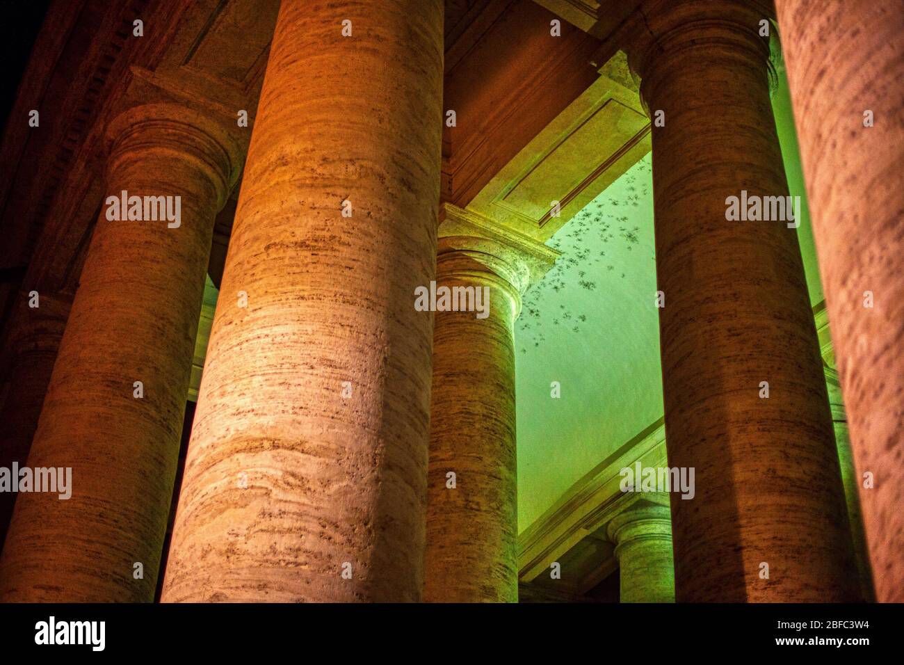 Roman colonnade illuminated in the night Stock Photo - Alamy