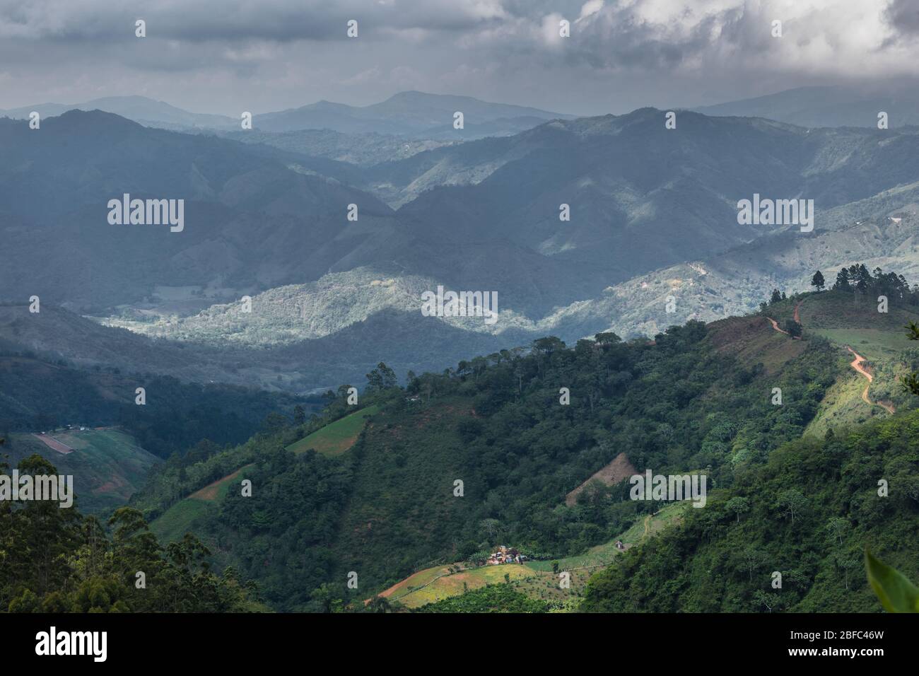 dramatic landscape image of the caribbean mountains in the dominican ...